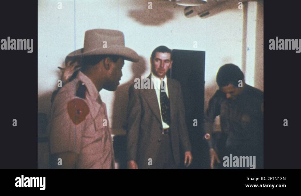 1950s: Police Officer recruits try on uniforms. Officers graduate Stock ...