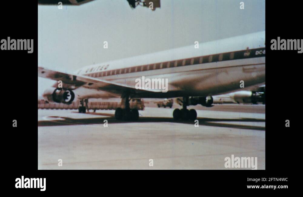 1960s: Moving Corridor ('Jetway') Being Attached to Jet Plane Stock ...