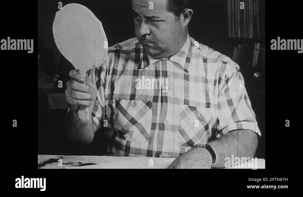 1950s: Cartoonist Looks at his Own Expression in a Mirror Stock Video ...