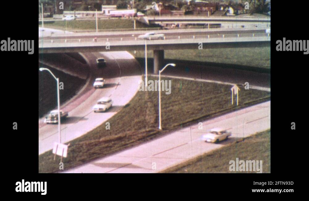 UNITED STATES 1960s: View of highways / View of highways / Car enters ...