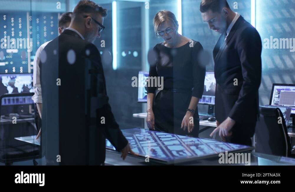 Team of Government Agents Tracking Fugitive with Help of Touchscreen ...