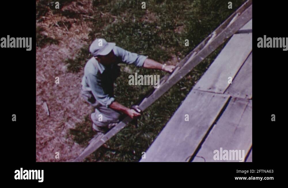 Man working on ladder Stock Videos & Footage - HD and 4K Video Clips ...