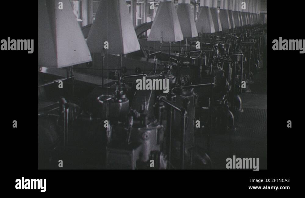 1940s: Interior of oil refinery / Pan of exterior of oil refinery Stock ...