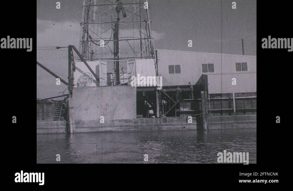 1940s: View of offshore oil rig from moving boat Stock Video Footage ...