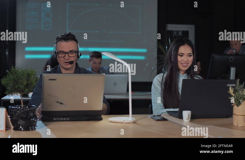 People working in call center at night Stock Video Footage - Alamy