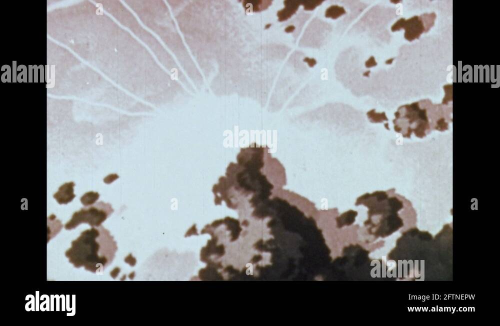 1940s: Animated, aerial view of landscape, zoom in / Outhouse explodes ...