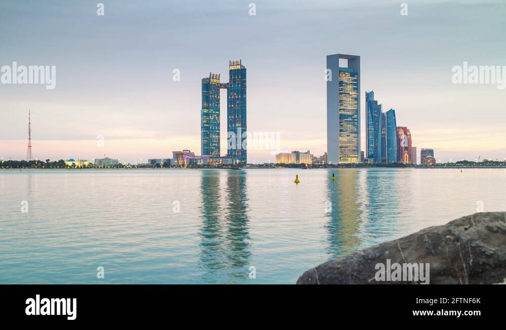 abu dhabi marina bay corniche beach sunset panorama 4k time lapse uae ...