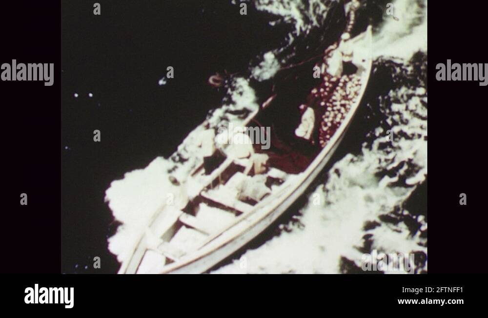 1950s: Boat Creates Net Circle Around Mackerel Stock Video Footage - Alamy