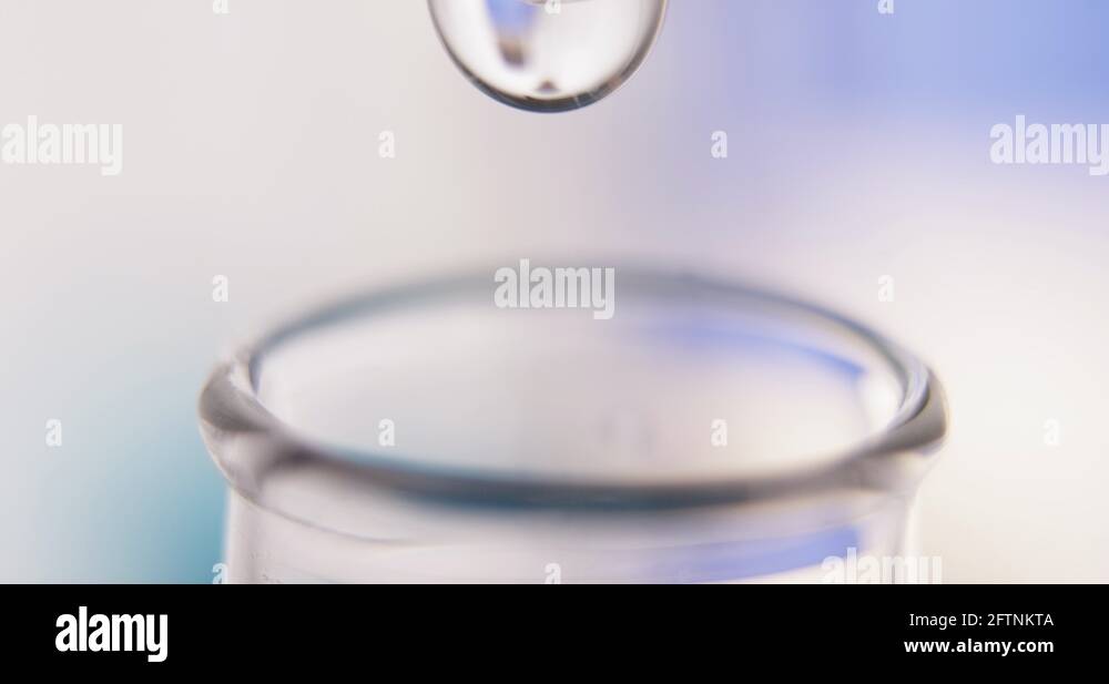 Drops falling test tube close Stock Videos & Footage - HD and 4K Video ...