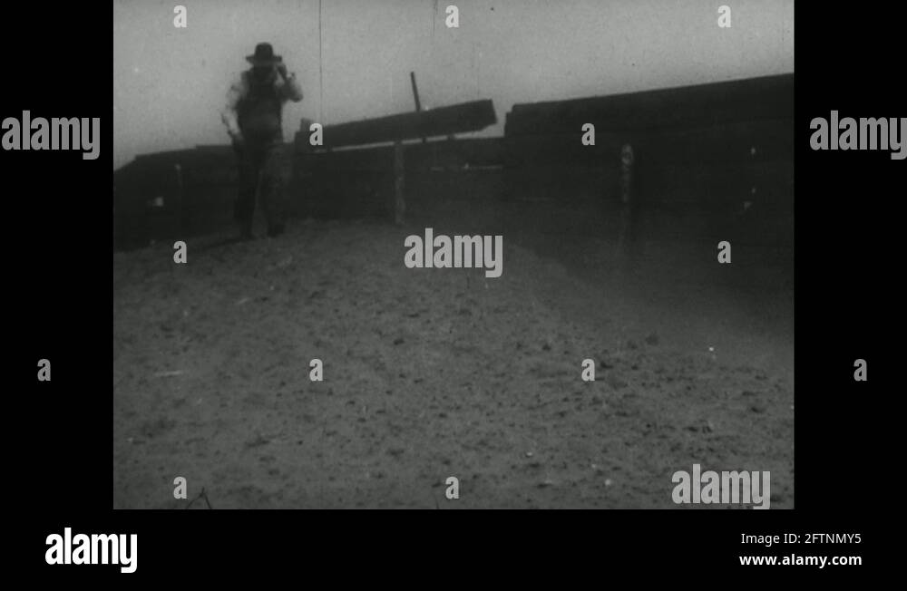 UNITED STATES 1930s: Man running in dust storm / Views of dust blowing ...