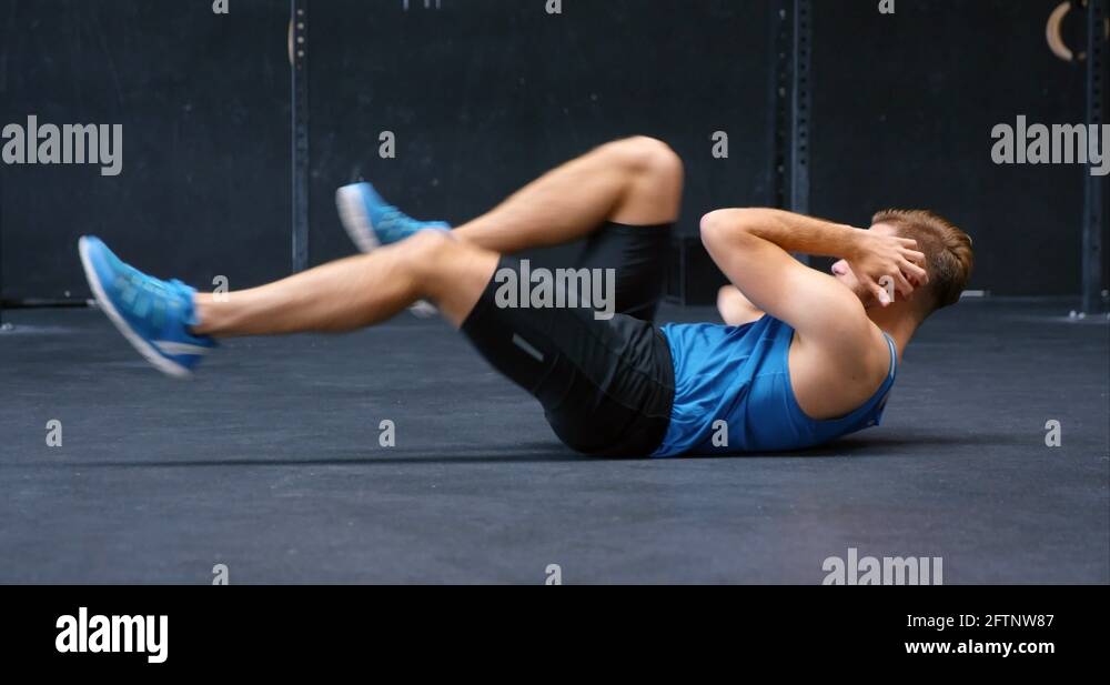 Man doing sit ups gym Stock Videos & Footage - HD and 4K Video Clips ...