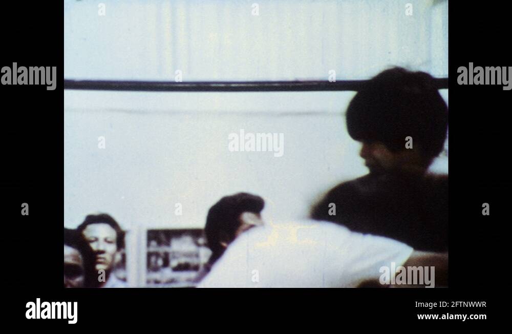 1970s: young guys boxing in ring. Guy watches boxing practice Stock ...