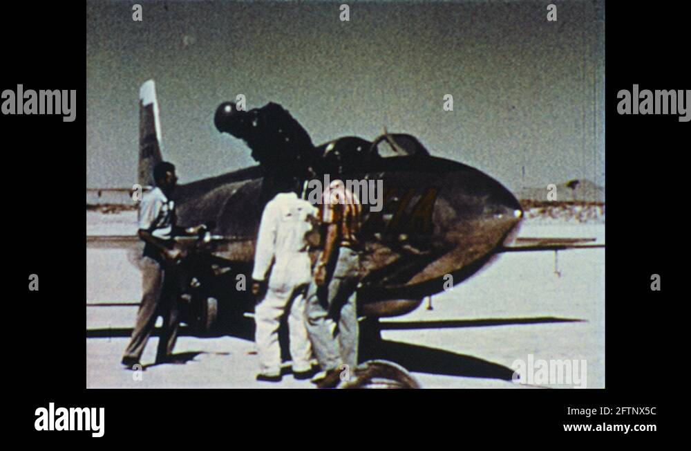 1960s: Pilot climbs down from fighter plane cabin. Pilot in locker room ...