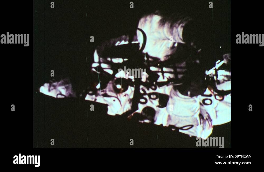 1960s: NASA astronaut climbs ladder towards hatch door. Astronaut ...