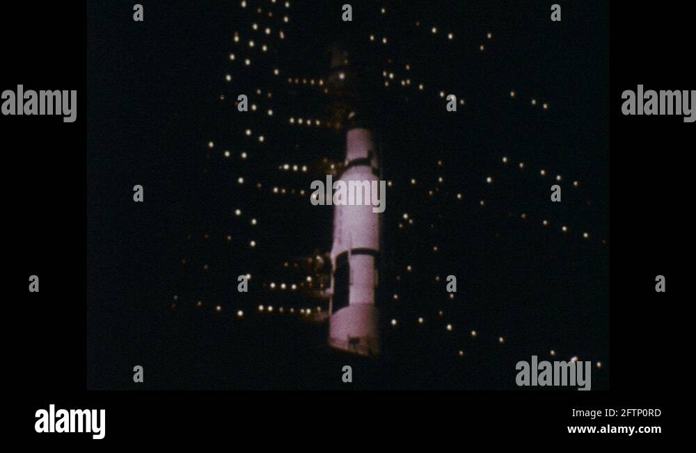 1960s: View of rocket / Pan of control room / Tilt down rocket Stock ...