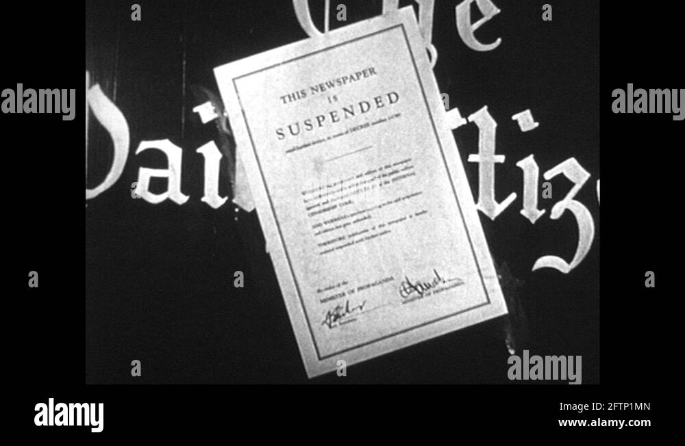 1940s: 'This Newspaper is Suspended' note on a door. Man leaves room ...