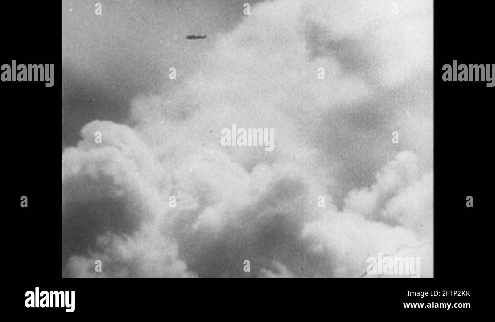 1940s: military planes in battle. Damage on side of plane as bullets ...