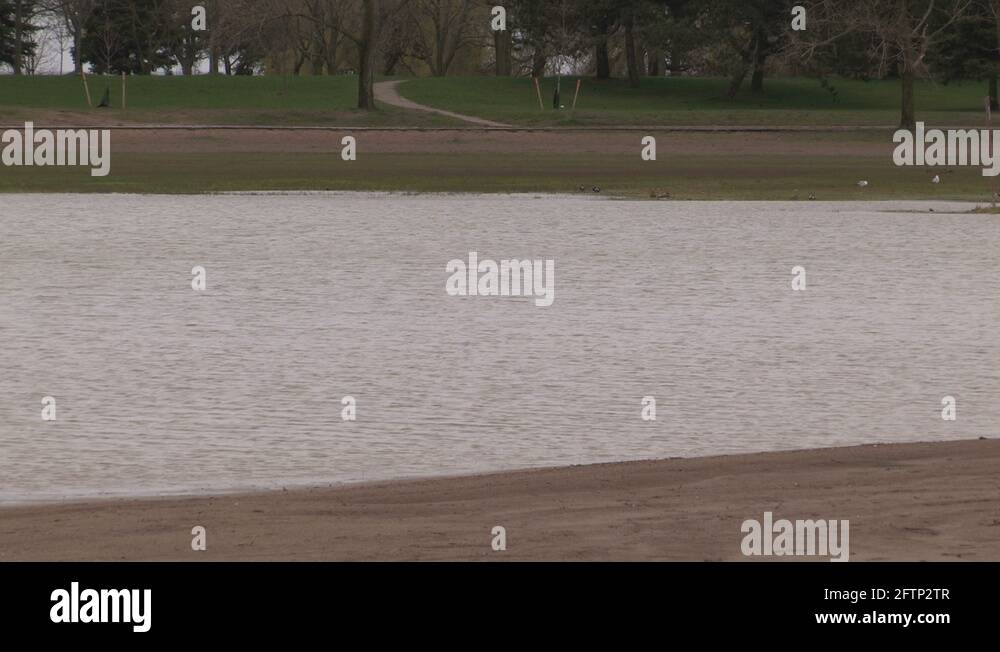 Rising water levels on lakes oceans and seas cause beach flooding and ...