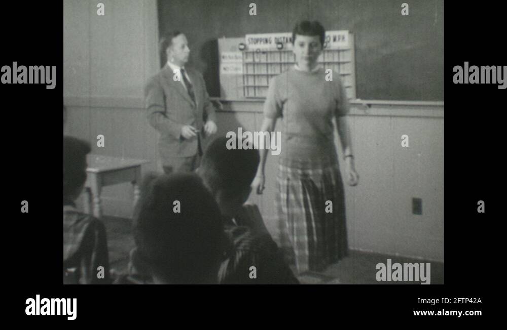 UNITED STATES, 1950s: Teacher places model car inside chart on ...