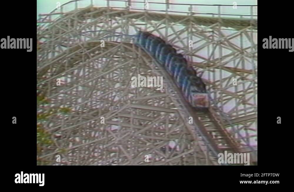 UNITED STATES: 1990s: rollercoaster ride. Girl on trampoline. Girl ...