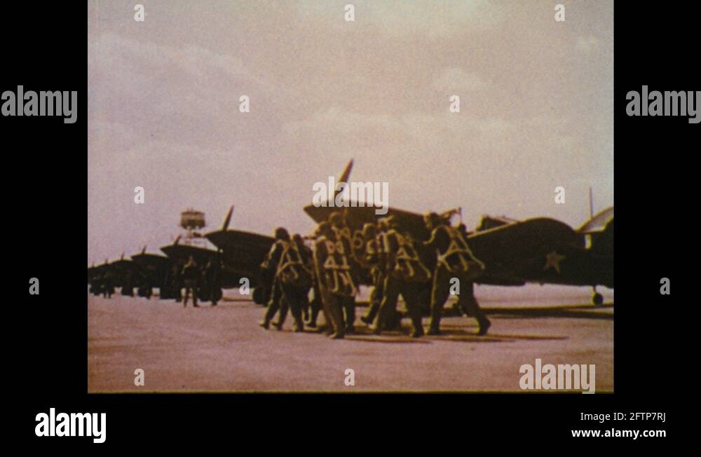 1960s: Pilots walk towards planes. Men march during USAF parade. Pilots ...