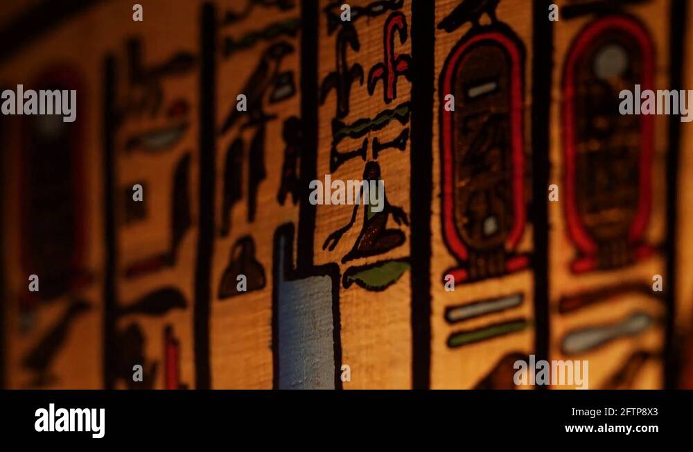 Old Ancient Egyptian Hieroglyphics Artifacts on Papyrus Lighted By Fire ...