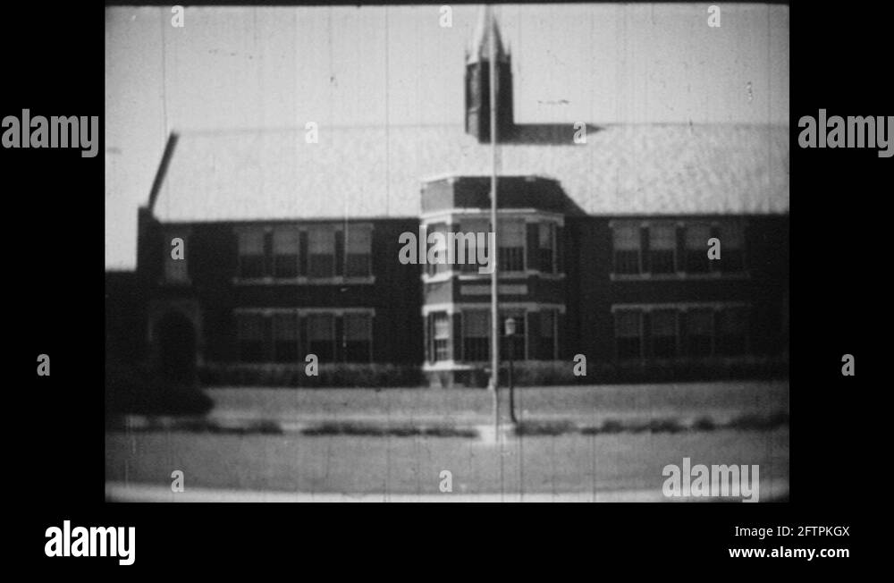 UNITED STATES: 1950s: Side profile of school building. School windows ...