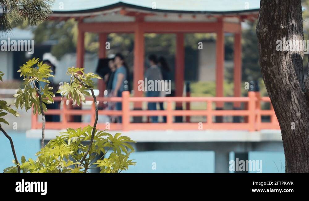 Red Japanese-style temple house floating on lake Stock Video Footage ...