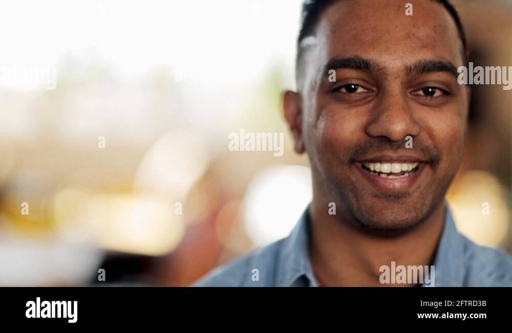 face of happy smiling hindu man Stock Video Footage - Alamy