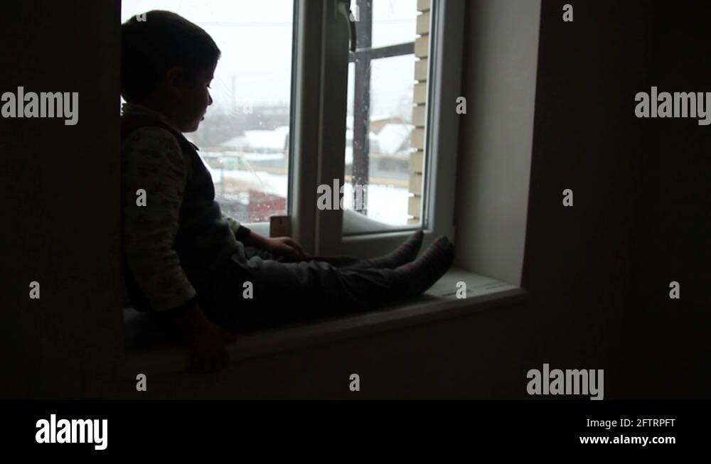Boy sitting on a window Stock Videos & Footage - HD and 4K Video Clips ...