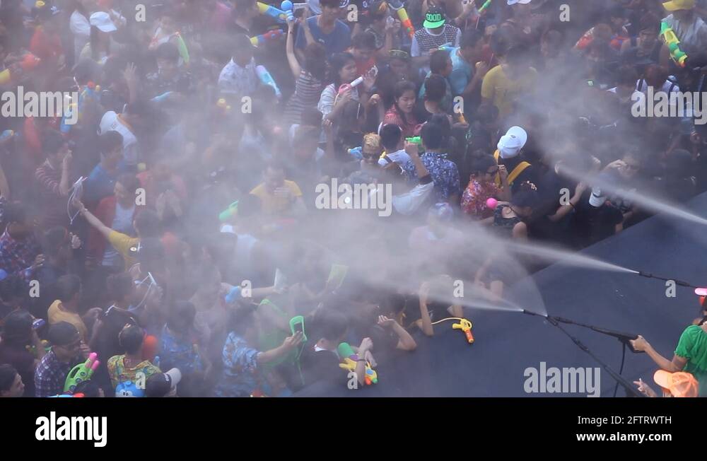 People splash each other with water to celebrate Songkran new year in ...