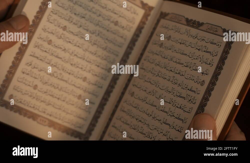 Reading the Koran, Quran, the arabic holy book. Close-up Stock Video ...