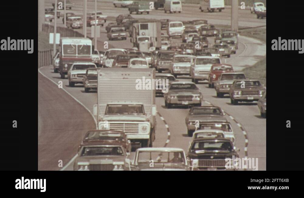 1970s: Cars on highway, fade out. Cars on road at night. Cars driving ...