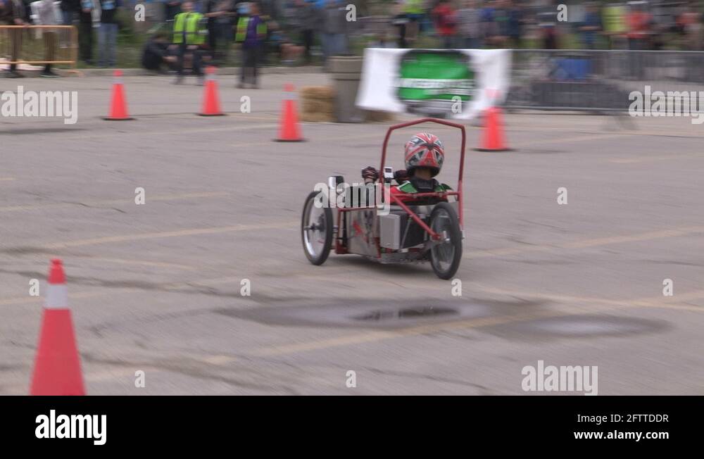 Students race electric cars on college campus in battery powered ...