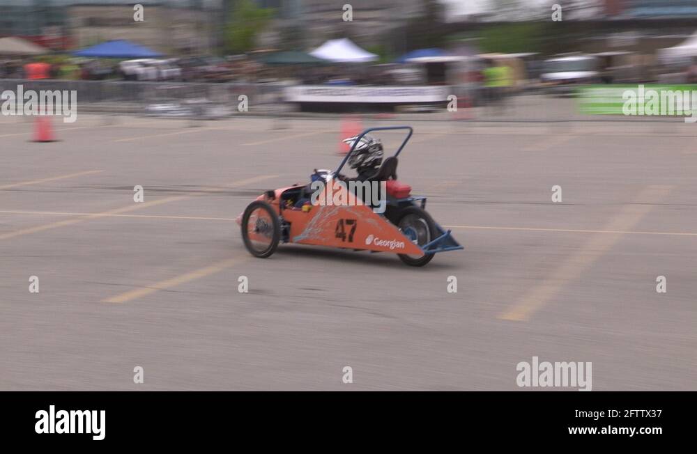 Students race electric cars on college campus in battery powered ...