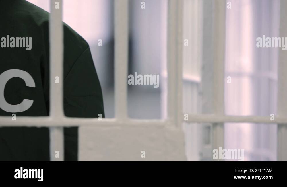 Inmate prison bars Stock Videos & Footage - HD and 4K Video Clips - Alamy