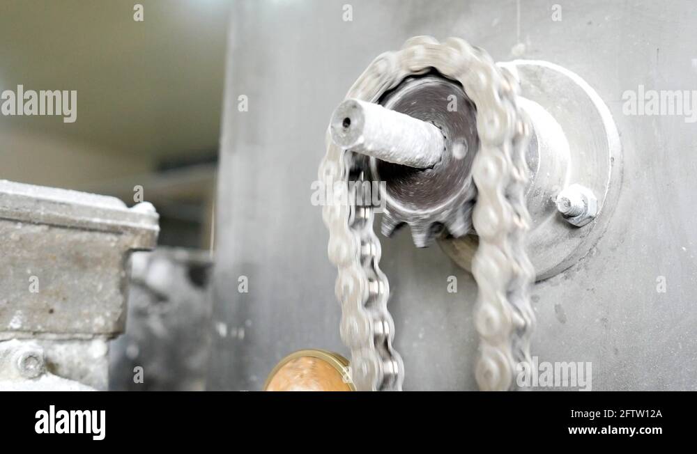 Chain of industrial lathe mechanism in manufacturing process Stock ...