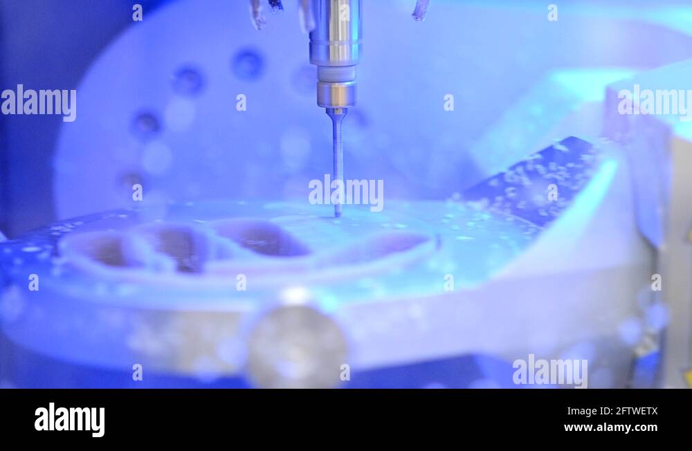 Dental milling machine carving out shape of human teeth Stock Video ...