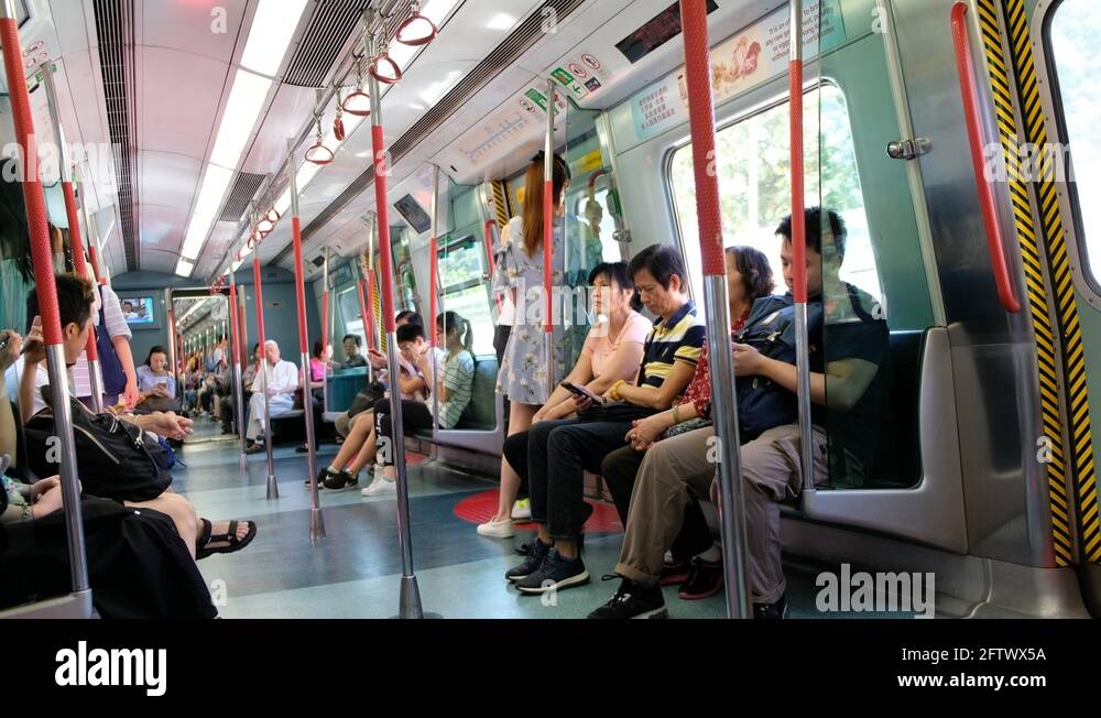Passenger inside an MTR train on the East Rail Line Stock Video Footage ...