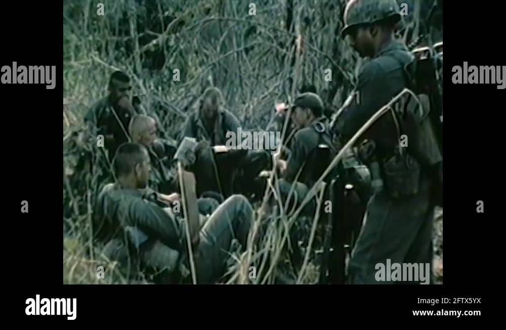 Vietnam War – 1965 – U.S. Soldiers checking maps and collectiong ...