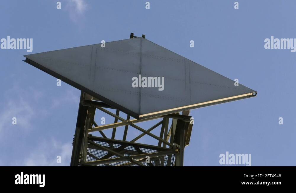 Pan: Rhombus-shaped object on top of a steel tower Stock Video Footage ...