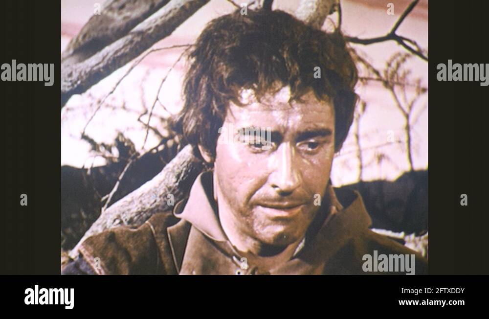 1960s: England: men pick up twigs. Man smiles Stock Video Footage - Alamy