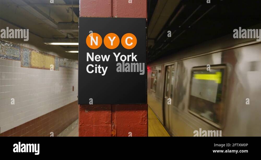 Manhattan Subway Approaches the Platform with New York City Sign Stock ...