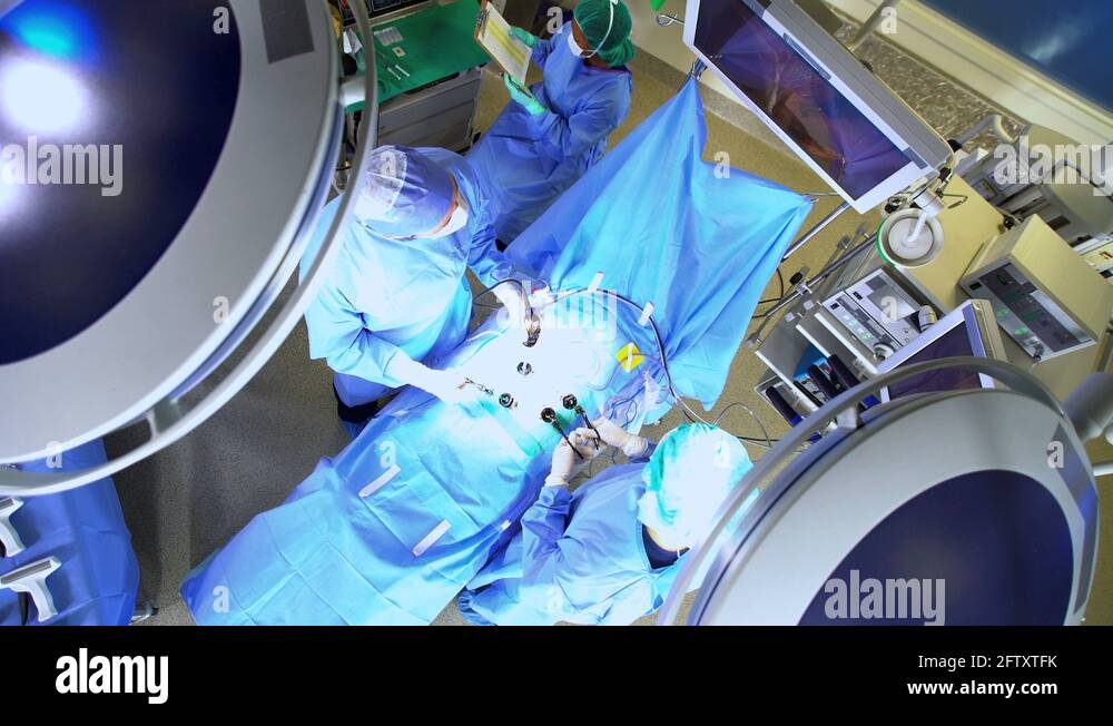Overhead view of Laparoscopy surgical operation transmitted on hospital ...