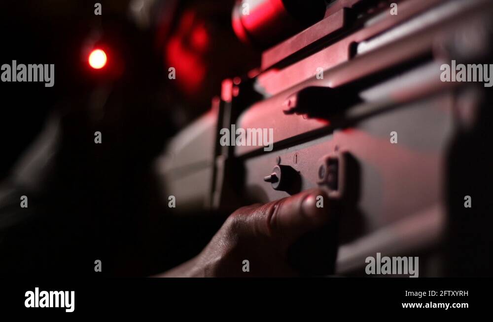 sniper clicking on and off safety on gun at night Stock Video Footage ...