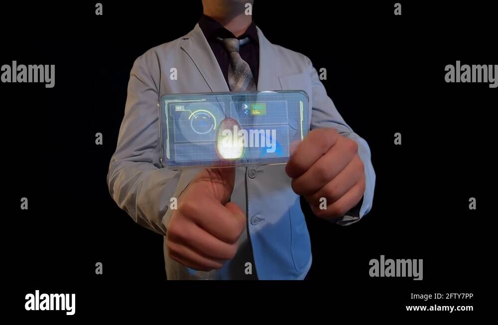 Man with a futuristic screen. The concept of the future Hologramic ...