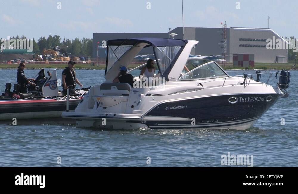 Police officers on marine unit patrol boat in Toronto harbor Stock ...
