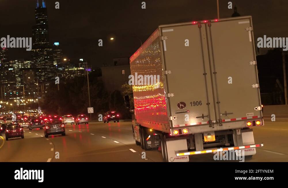 POV: Long line of cars caught in traffic jam on interstate highway into Chicago Stock Video ...