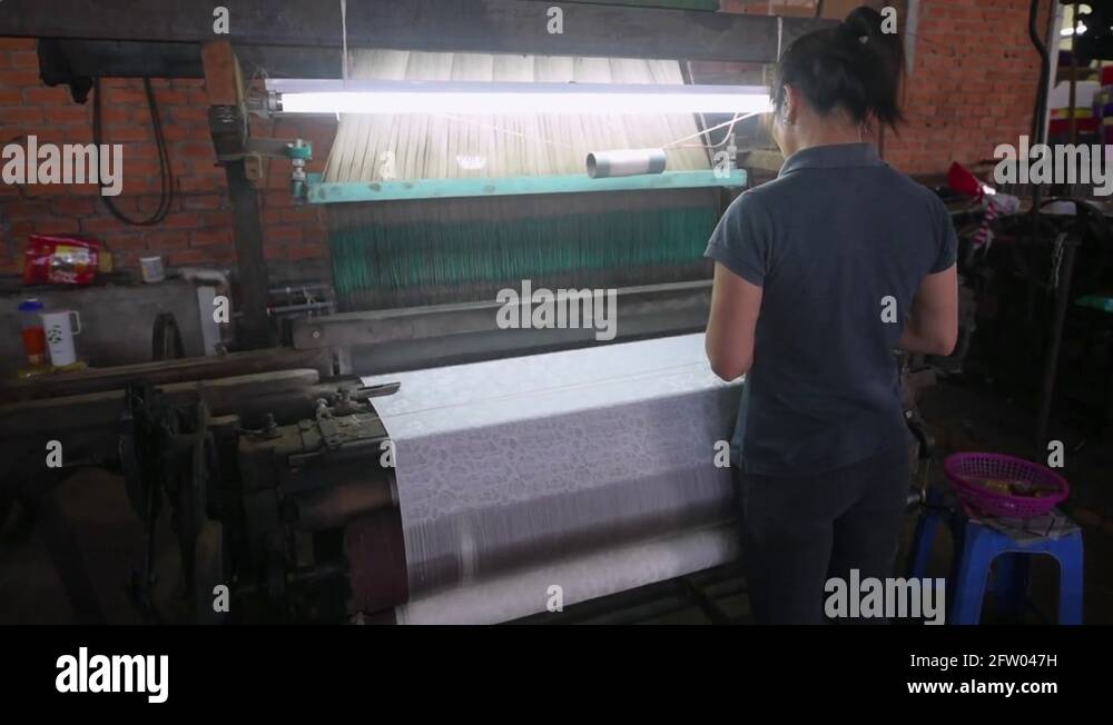 silk weaving in Vietnam Stock Video Footage - Alamy