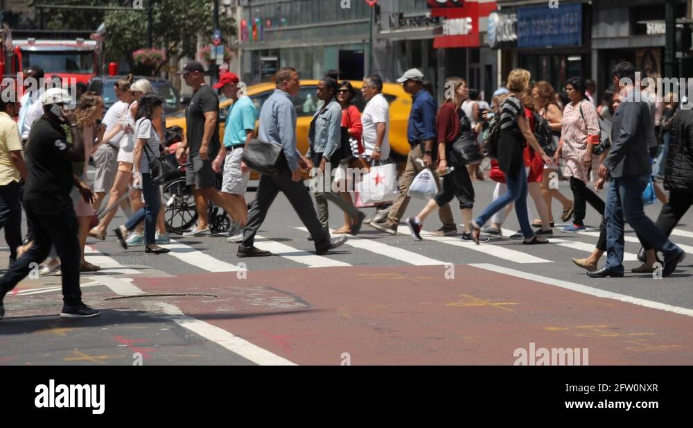 Crowd of people walking street in New York City Stock Video Footage - Alamy